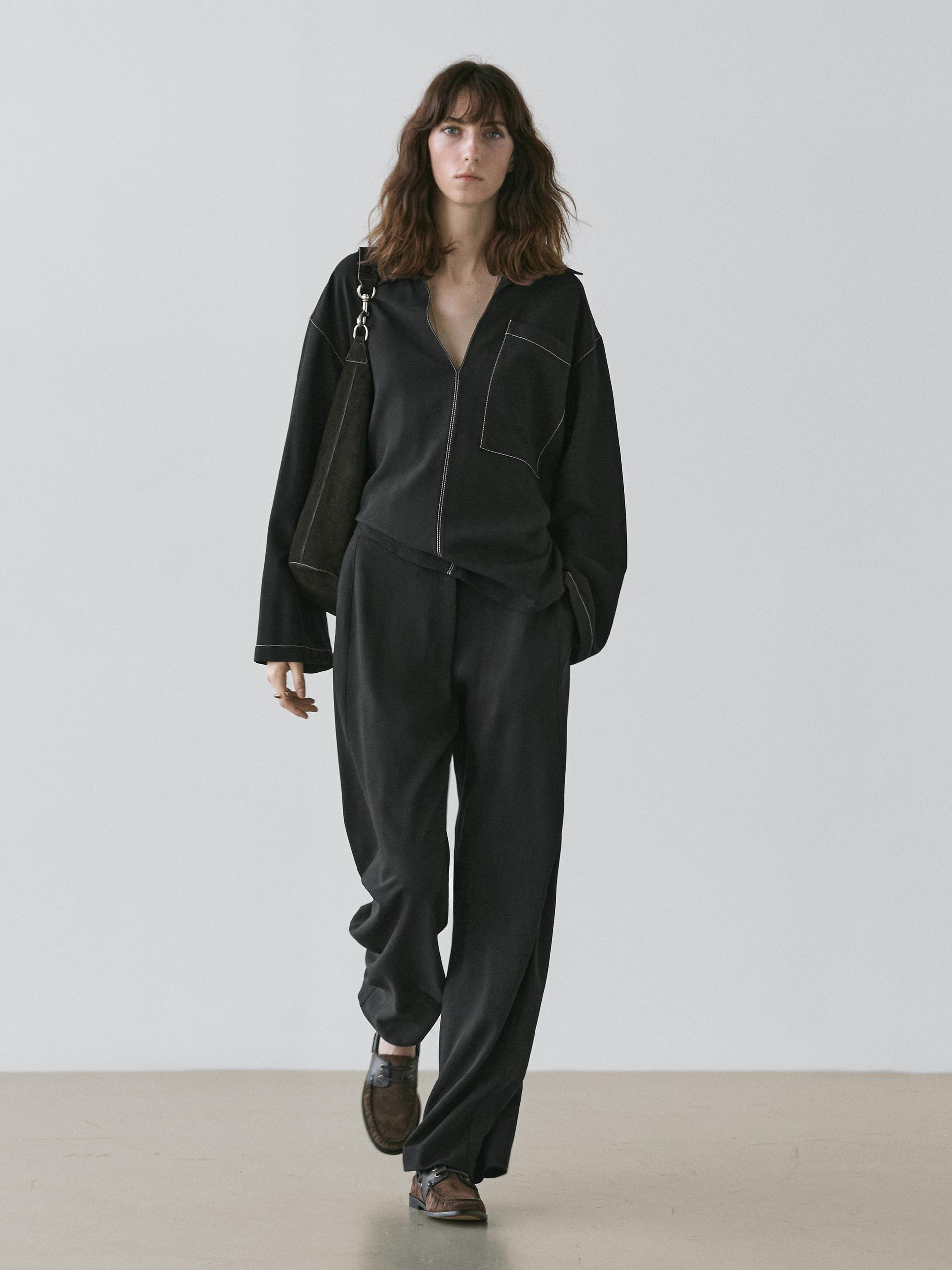 Calças com detalhe de costura e lã · Preto · Calças | Massimo Dutti