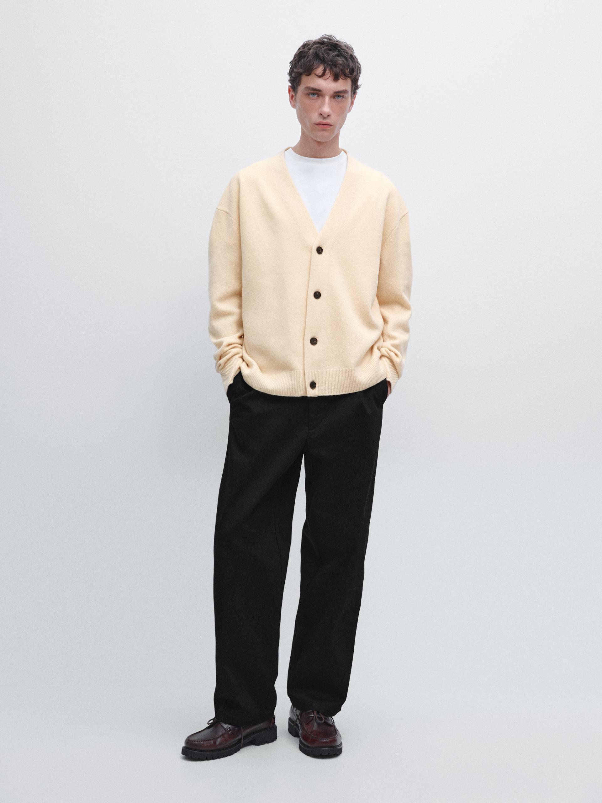 Wollen tricot vest met V-hals · Vanille · Tops En Andere Kledingstukken ...